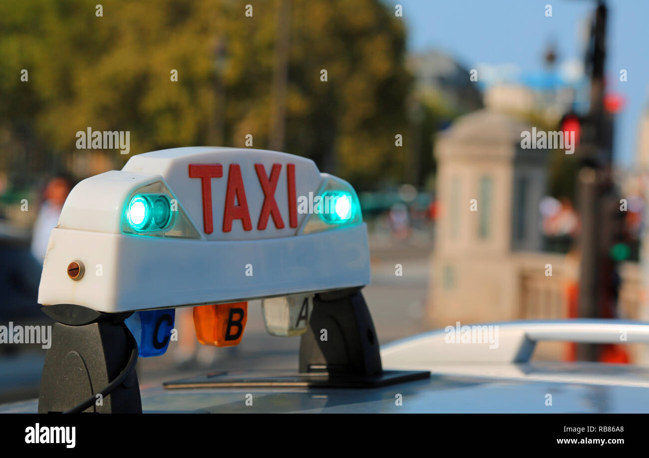 French luminous taxi top sign in Paris France Stock Photo - Alamy