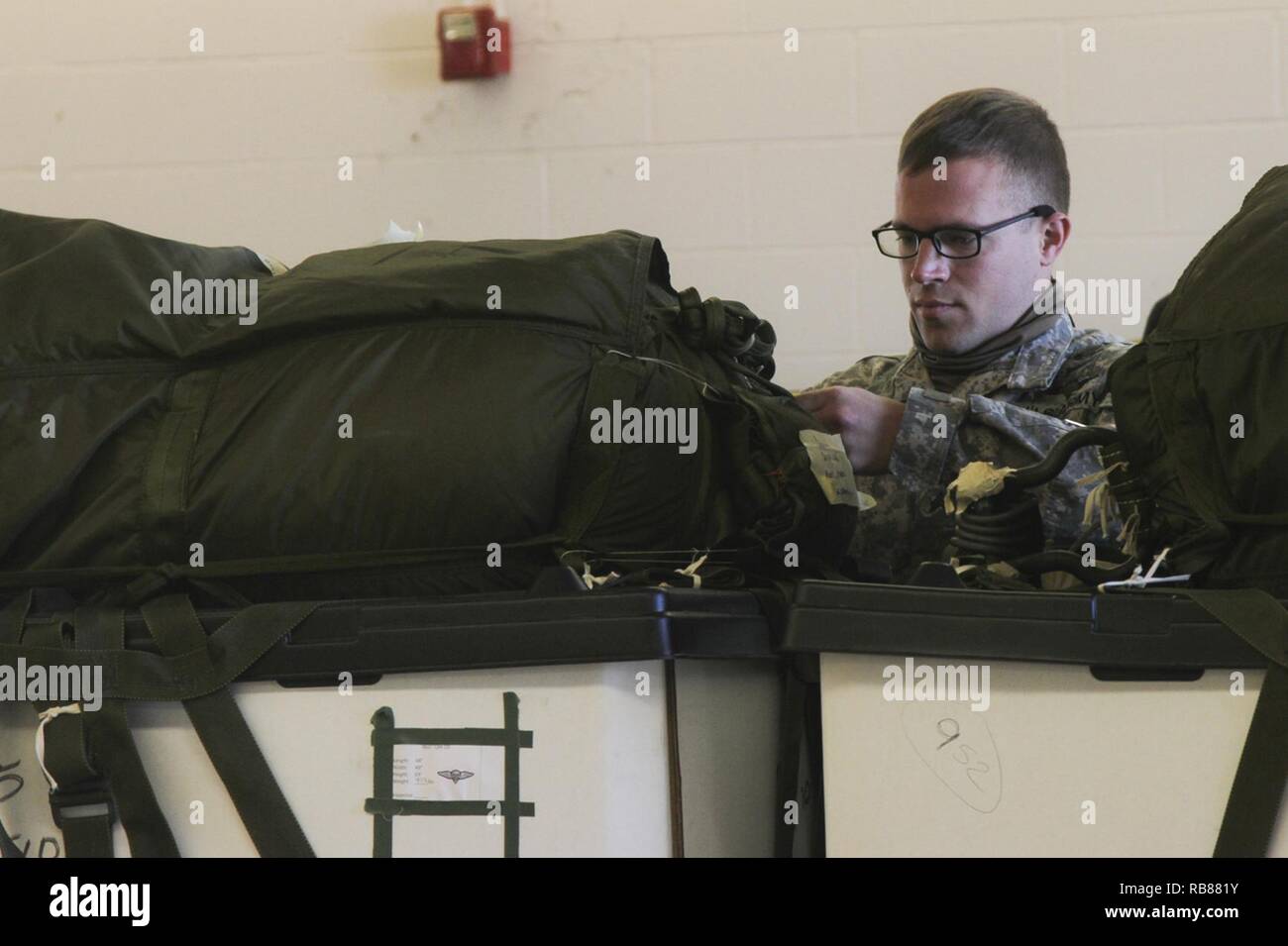 A parachute rigger with 861st Quartermaster Company, a reserve unit ...