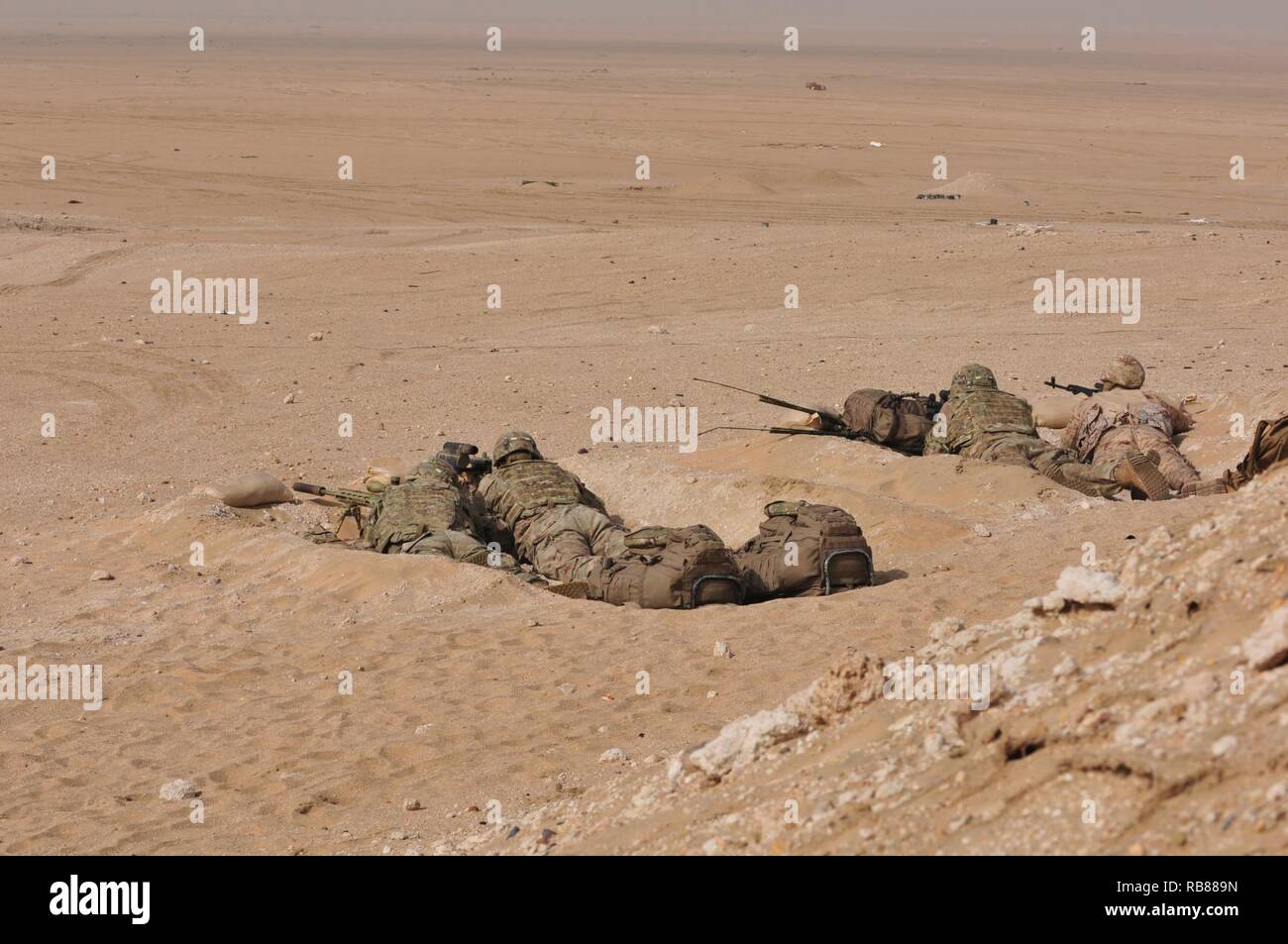 Sniper teams from the 3rd Armored Brigade Combat Team, 1st Armored ...