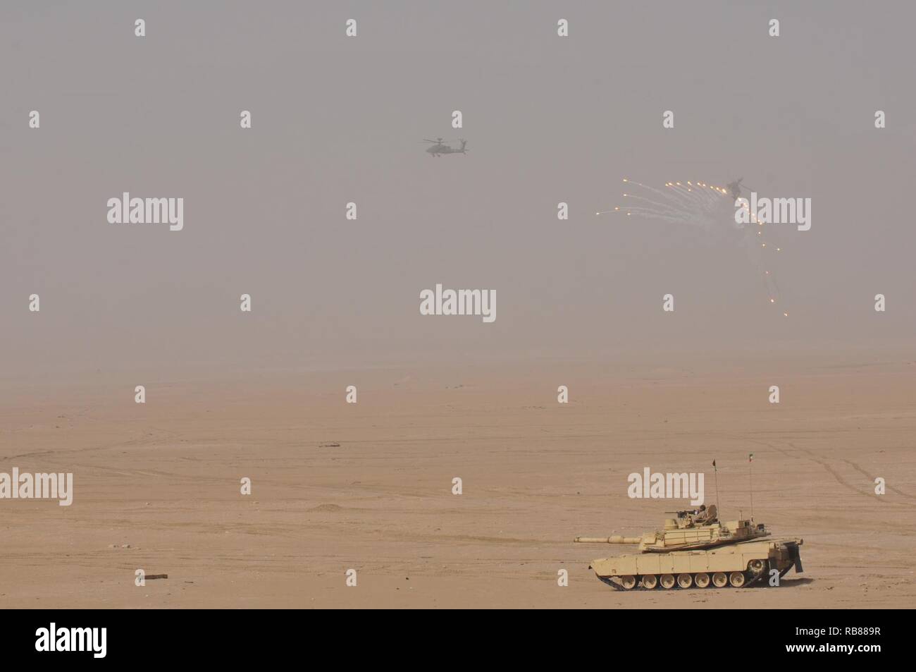 U.S. Army and Kuwaiti Land and Air forces move to engage targets during ...