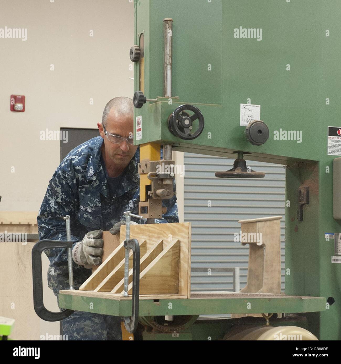 Petty Officer Frank Barone uses one of the jig saws in Anniston Army ...