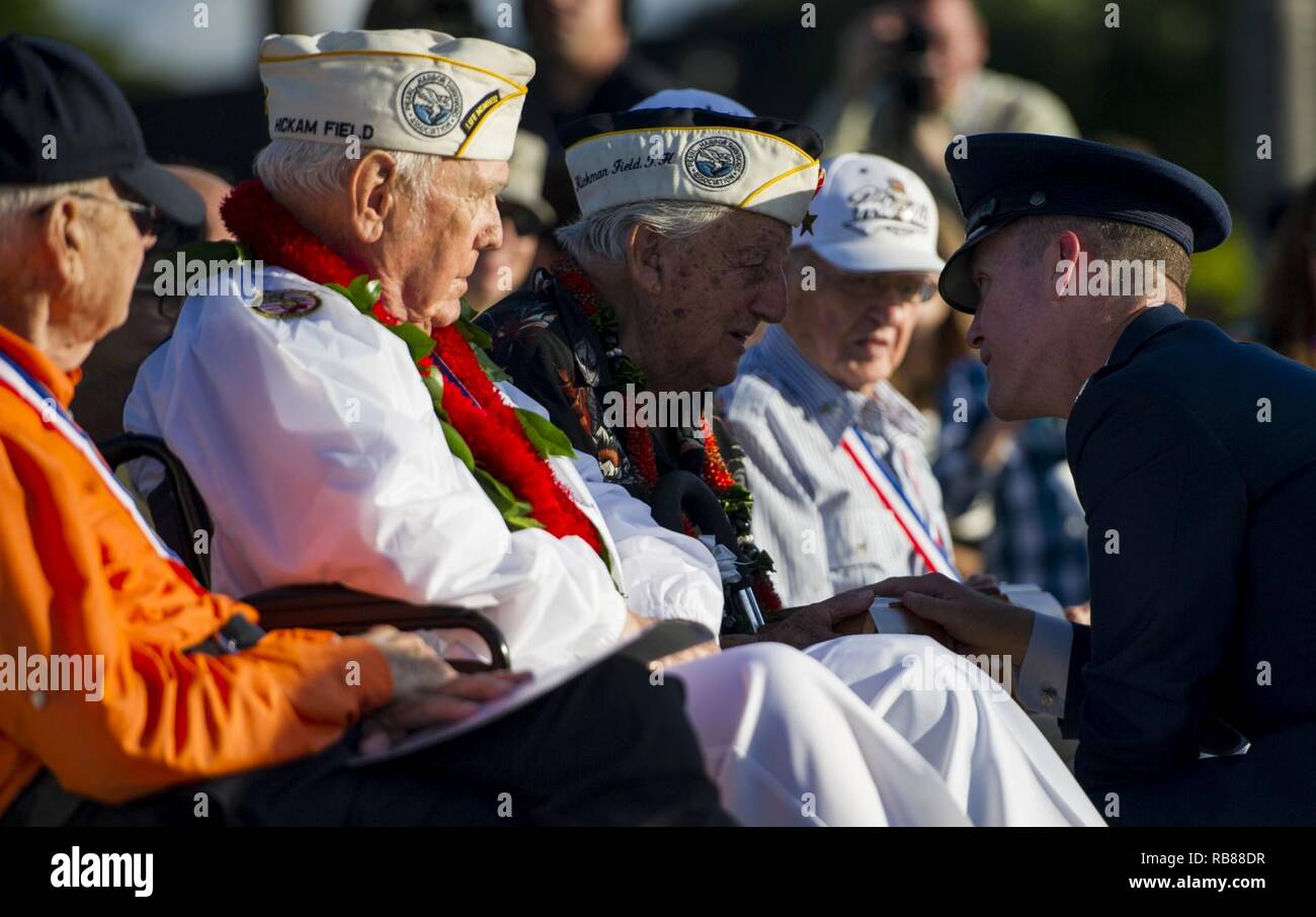 Col. Kevin Gordon, 15th Wing commander, presents a gift to (retired ...