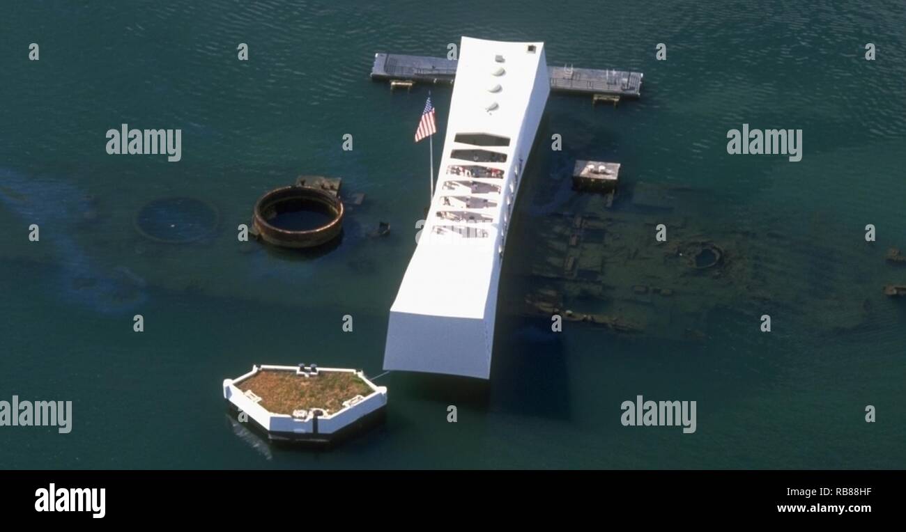 The USS Arizona Memorial, dedicated in 1962, straddles the remains of ...