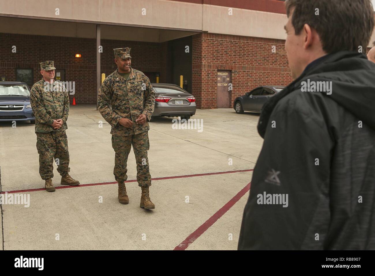 U.S. Marine Corps Lt. Col. Erik J. Smith, Commanding Officer, 2nd Maintenance Battalion, greets ...