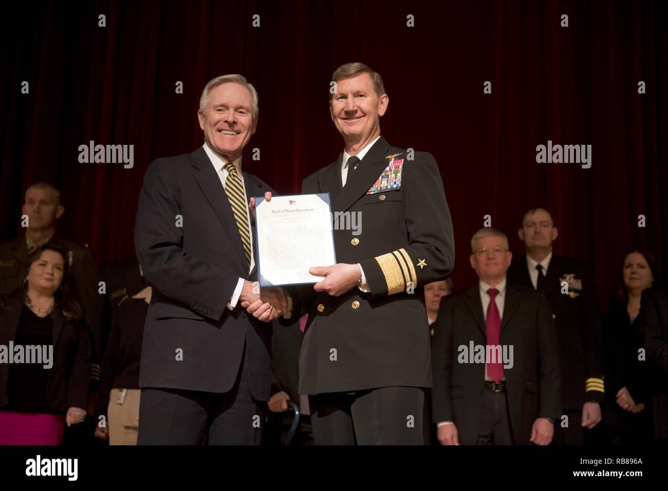 ANNAPOLIS, Md (Dec. 8, 2016) Secretary of the Navy Ray Mabus presents ...