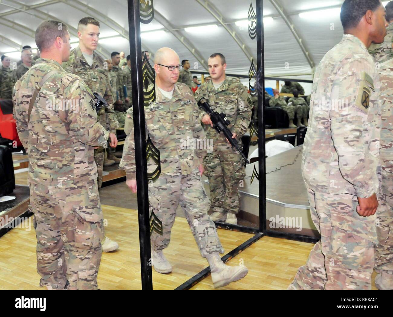A Soldier takes the ceremonial step across the Non-Commissioned Officer ...