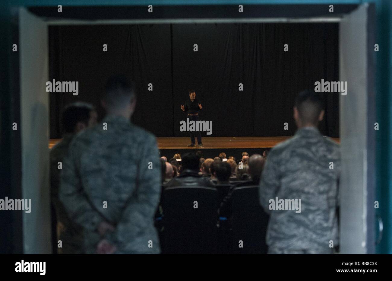 Airmen from the 57th Wing listen as Simon Sinek talks in the Base ...