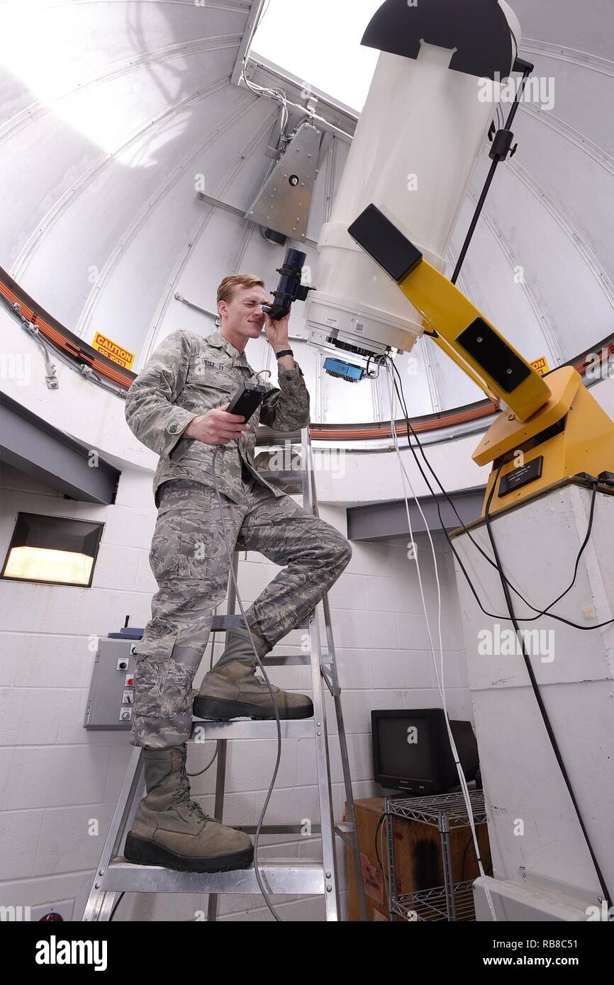 Daniel Weisz, a senior, works on a 16-inch telescope at the U.S. Air ...