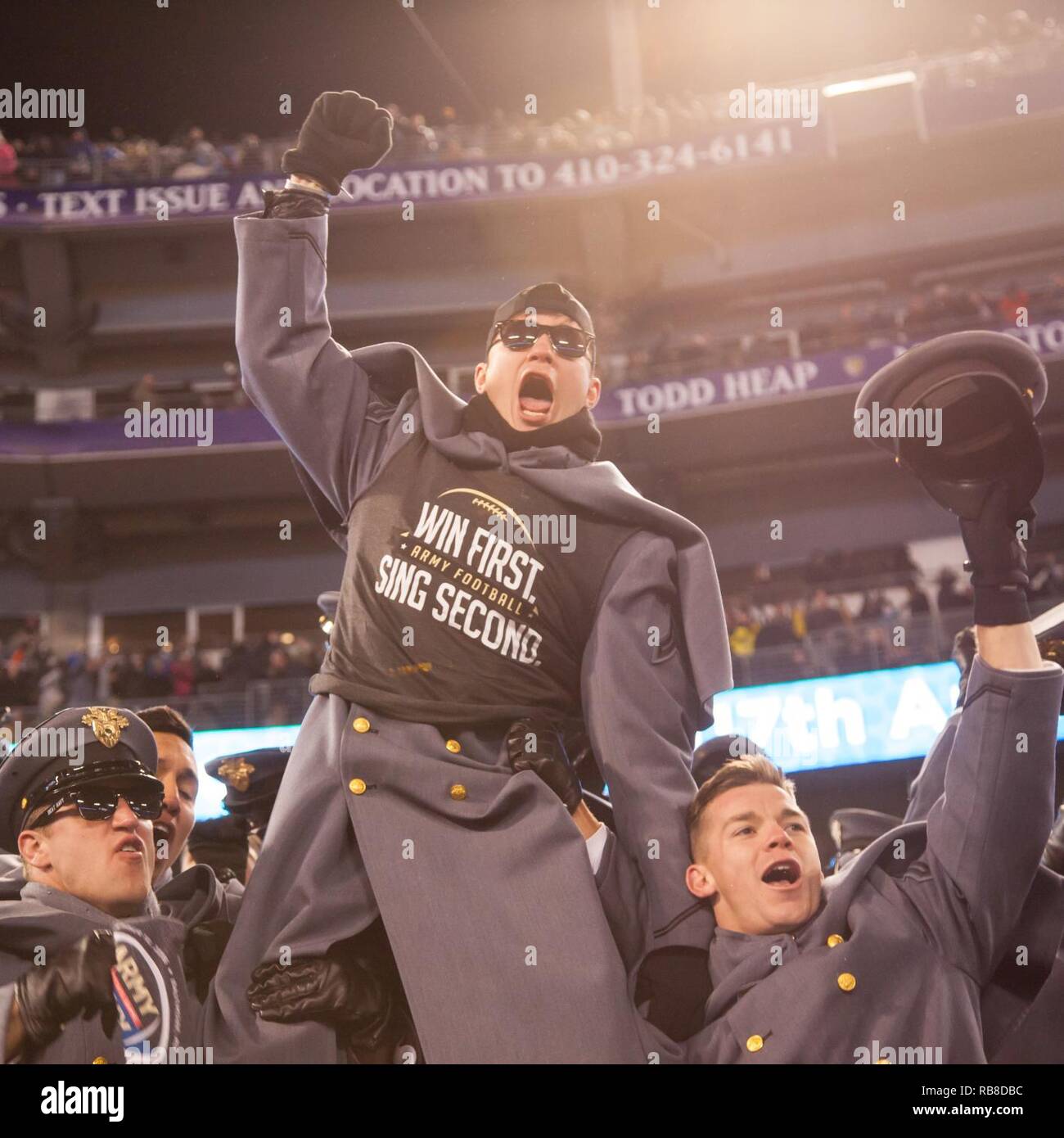 U.S. Military Academy cadets cheer during the 117th Army Navy Game at M ...