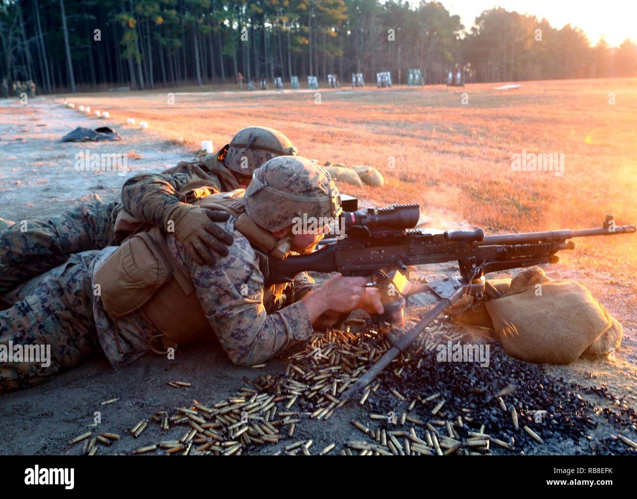 Lance Cpl. Logan M. Perkins taps Lance Cpl. Nickolas A. Coup on the ...