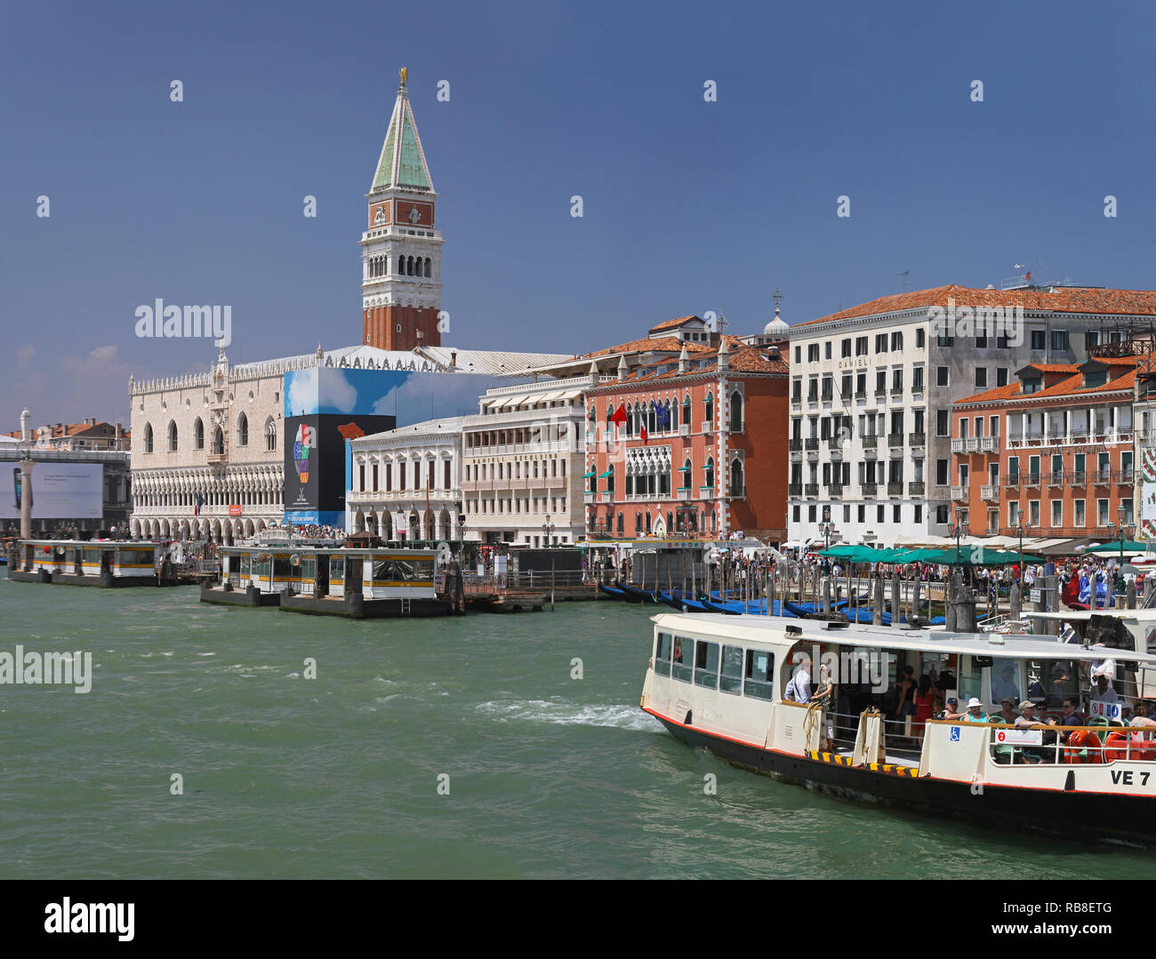 VENICE, ITALY - JULY 10: Water front with public transport vessels in ...