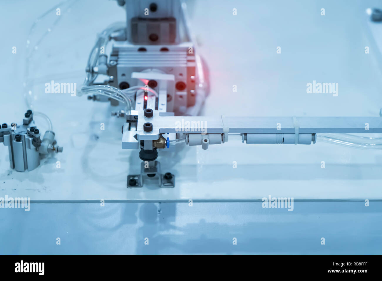 robotic pneumatic piston sucker unit on industrial machine,automation ...