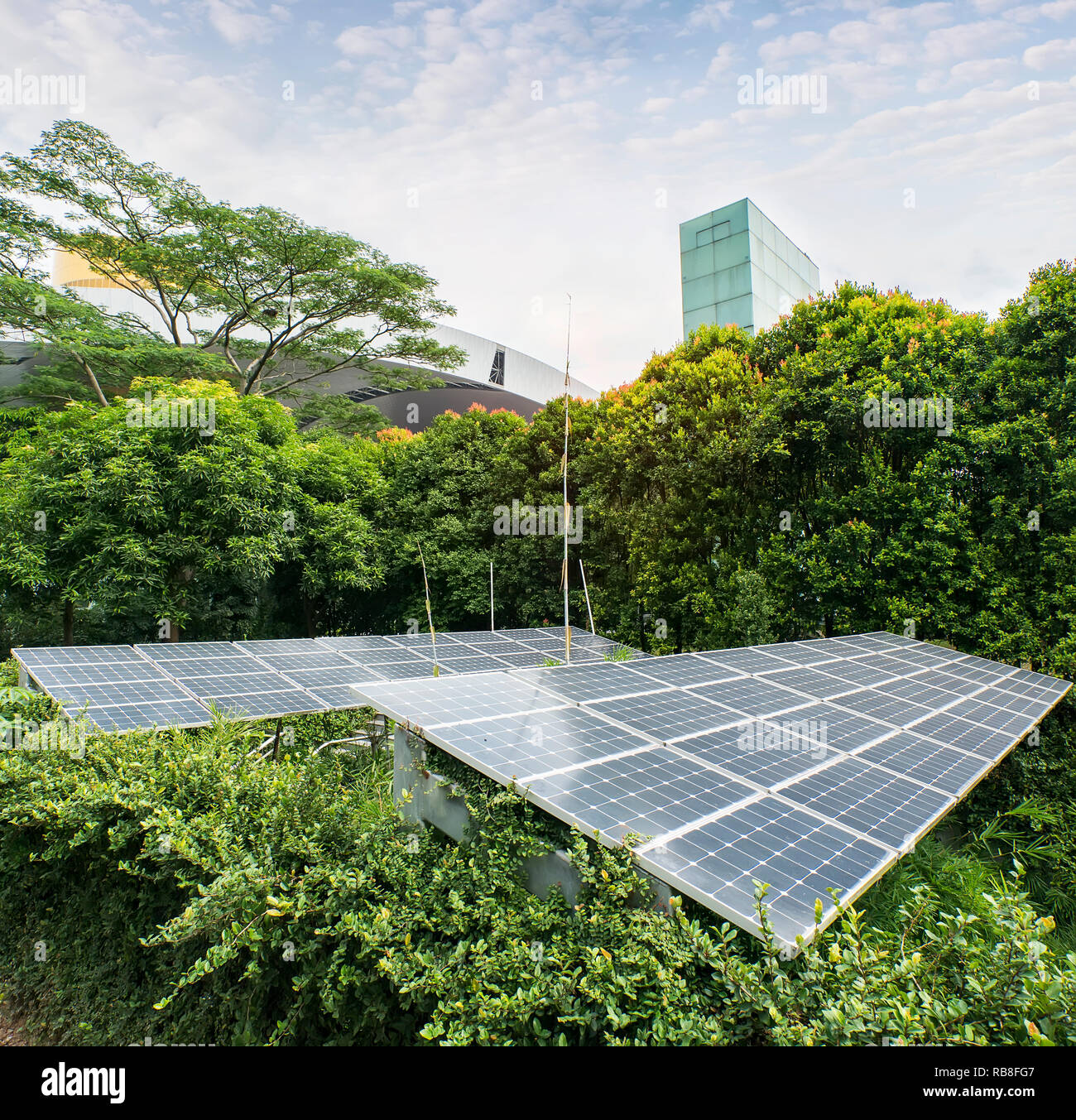 Ecological energy renewable solar panel plant with urban landscape ...