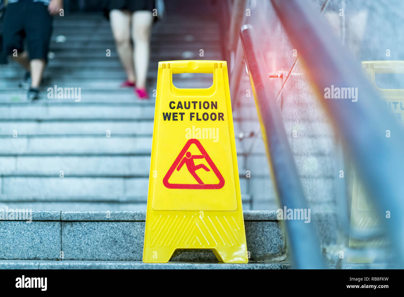 "Caution wet floor" sign Stock Photo - Alamy