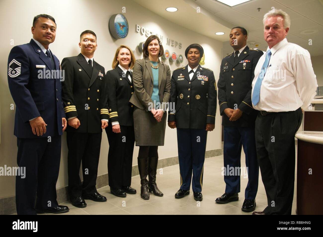 Staff of the Boston Military Entrance Processing Station stand in front ...