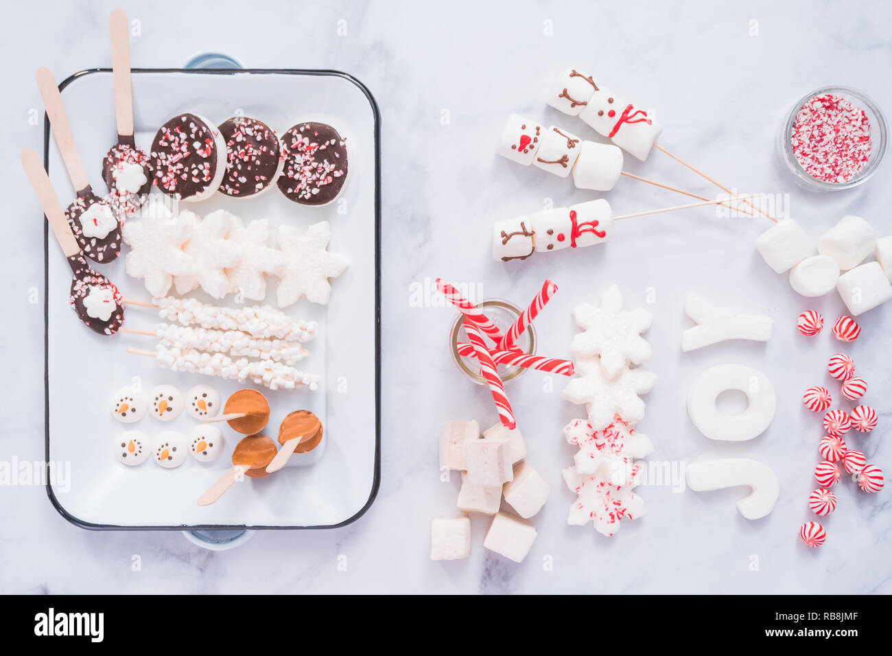 Flat lay. Variety of marshmallow toppings with peppermint and chocolate ...