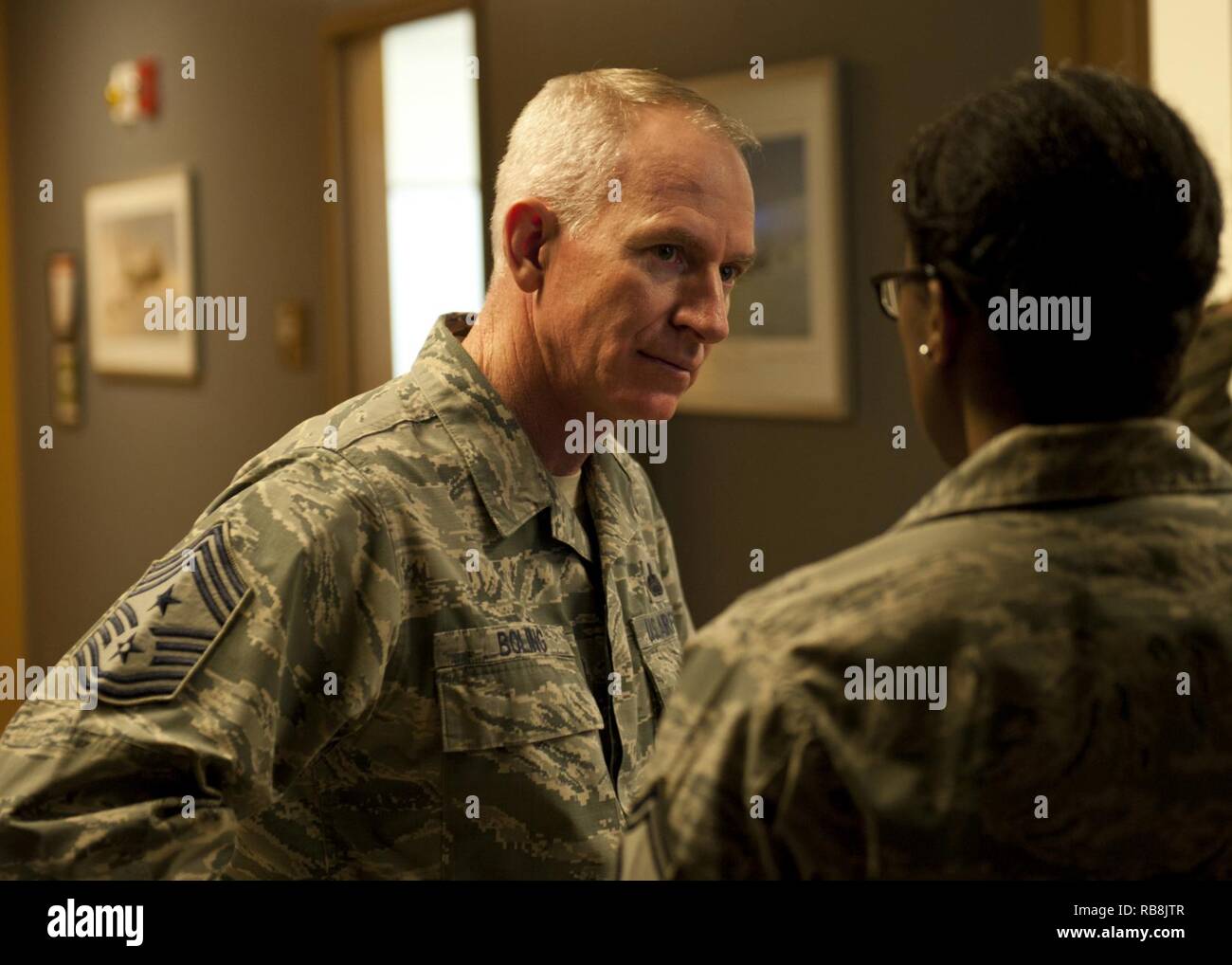 Chief Master Sgt. Alan Boling, 8th Air Force command chief, speaks with Senior Master Sgt ...