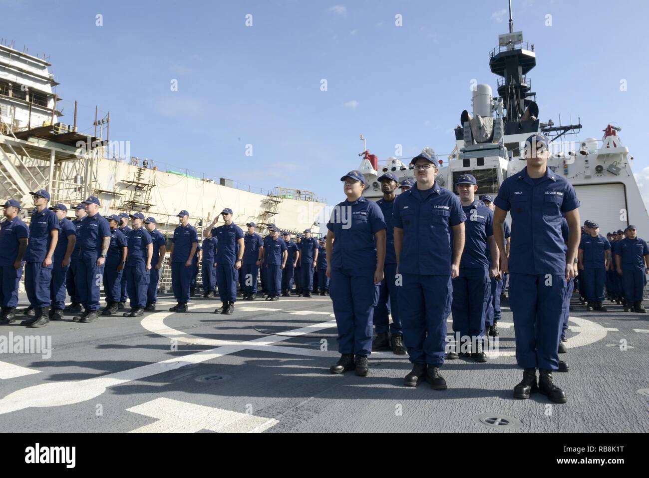Coast Guard Cutter Munro crewmembers render honors to the national ...