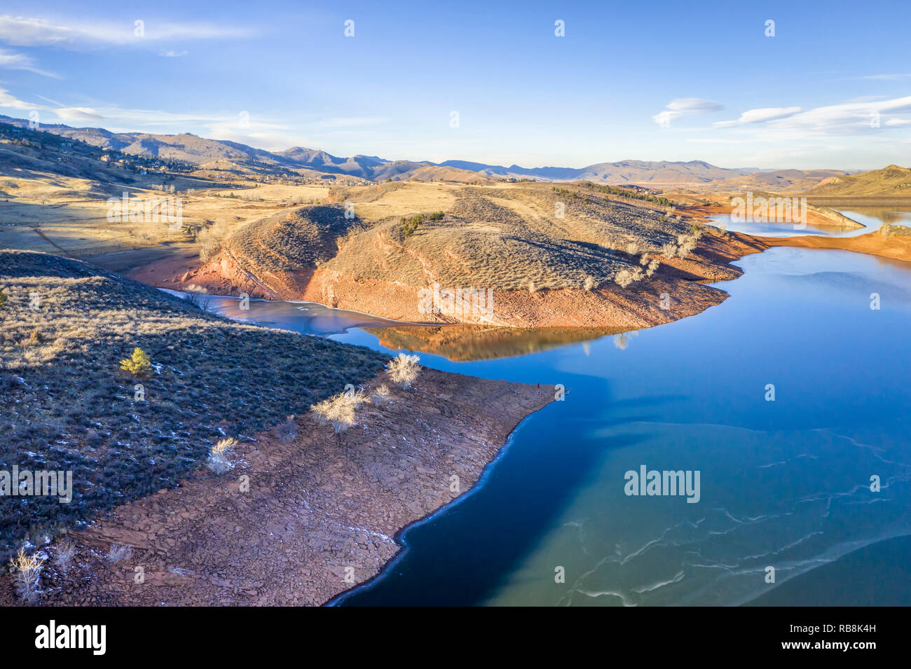 freezing mountain lake in northern Colorado foothills, typical early ...