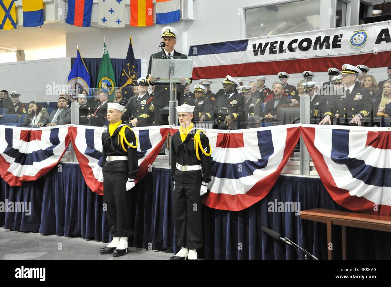 Chief of Naval Personnel Robert P. Burke speaks to the guests at the ...