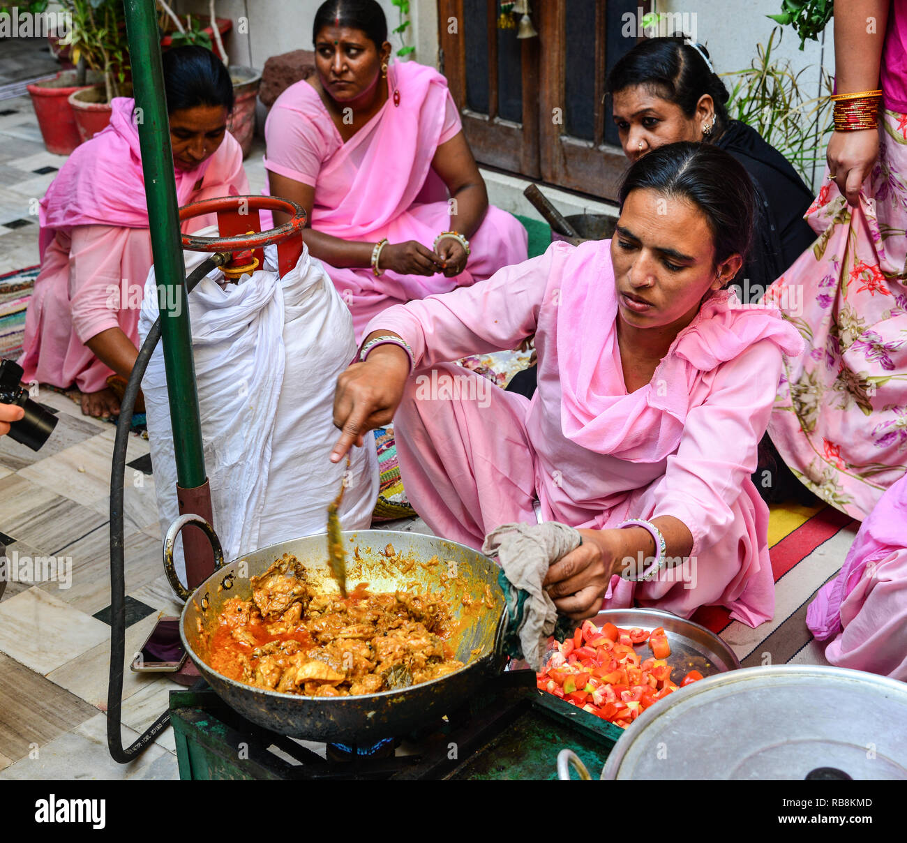 Jodhpur, India - Nov 6, 2017. Indian women cooking traditional food in ...