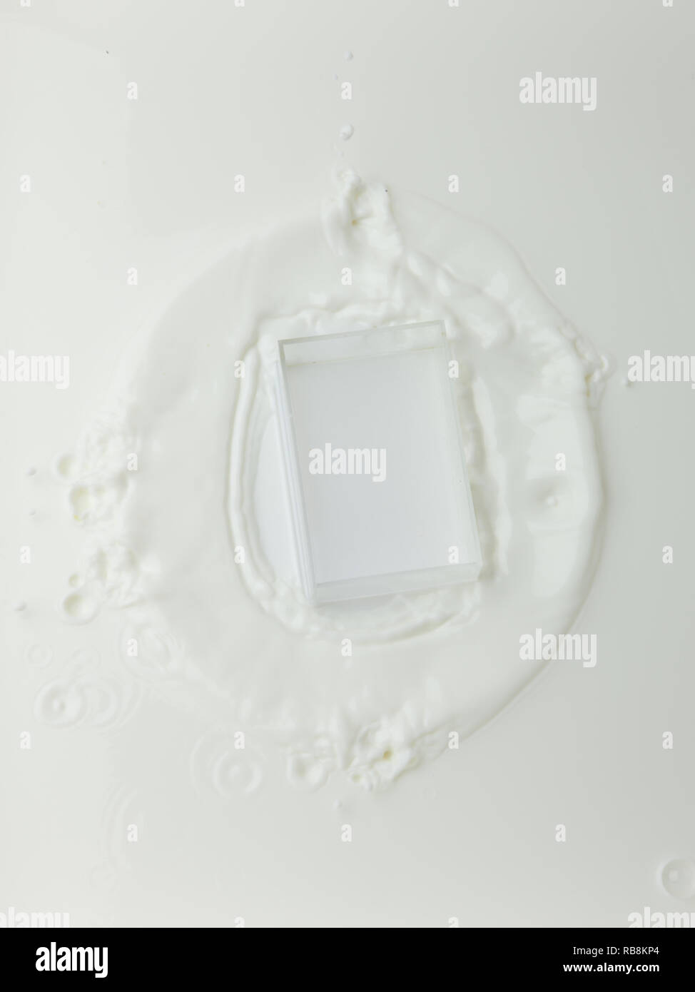 a milk wave. after falling into milk Stock Photo - Alamy