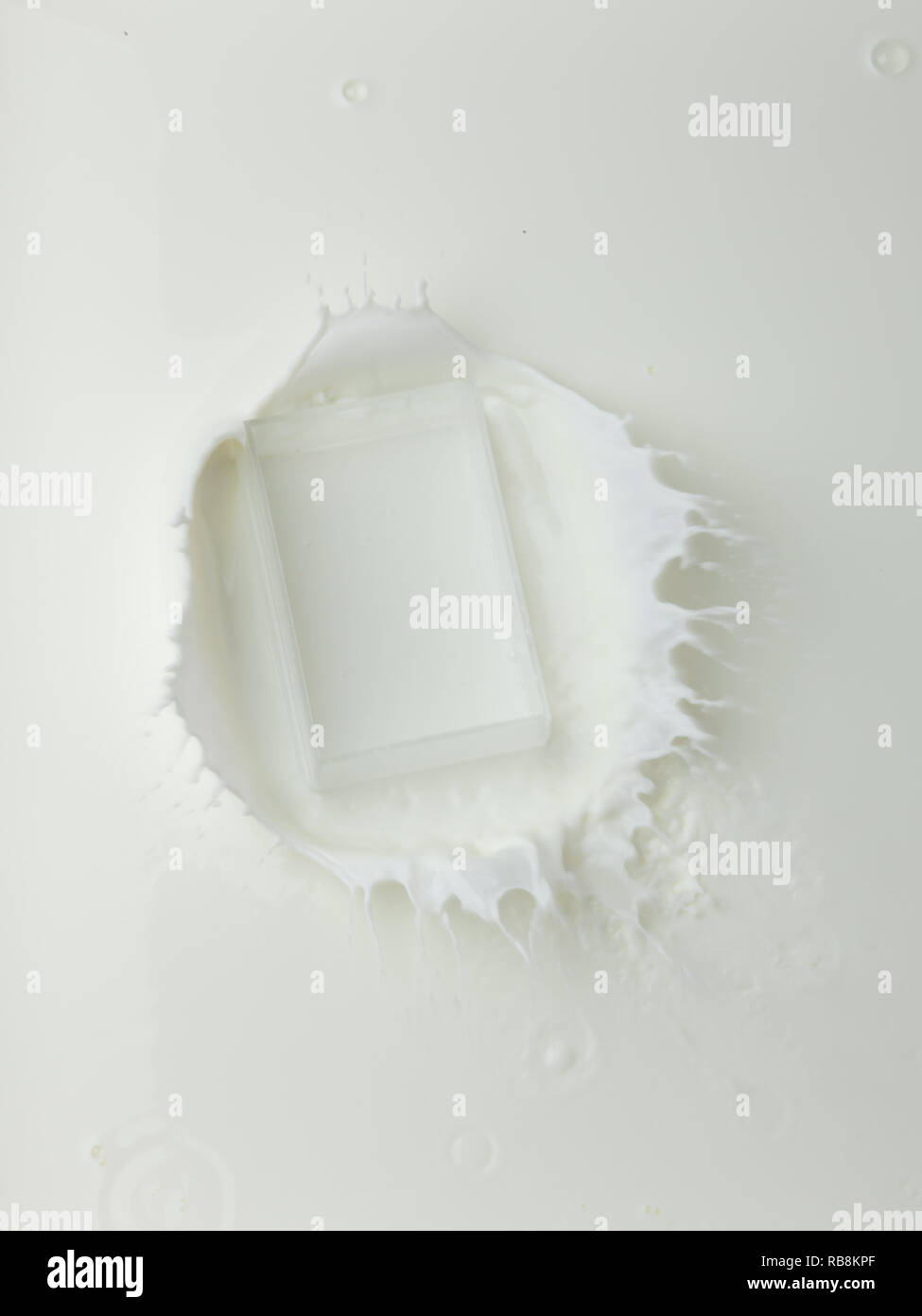 a milk wave. after falling into milk Stock Photo - Alamy