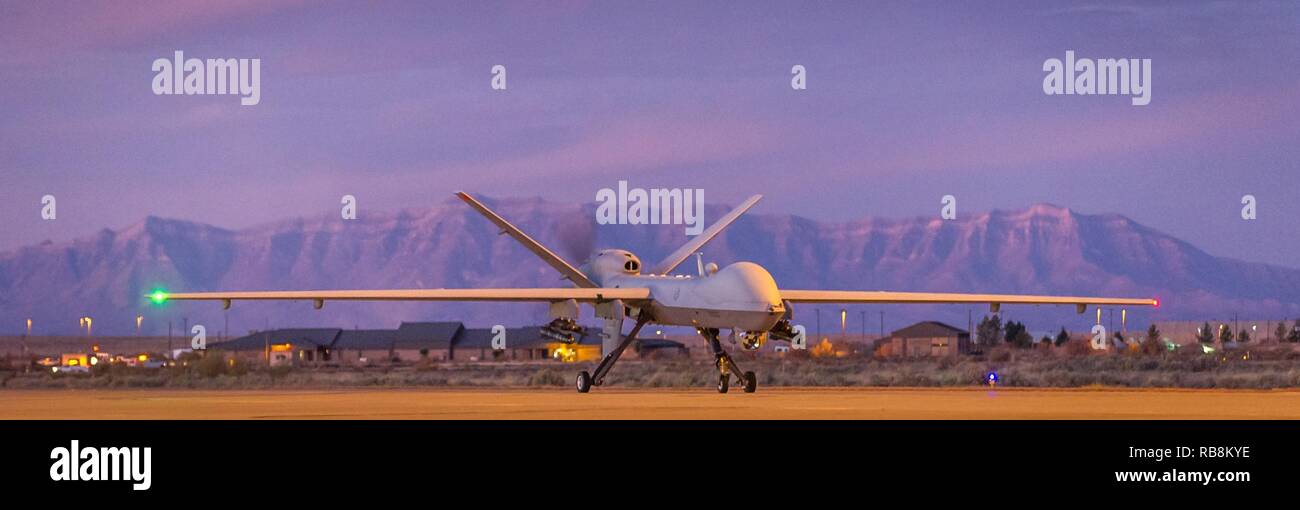 An MQ-9 Reaper remotely piloted aircraft taxis back to the flightline ...