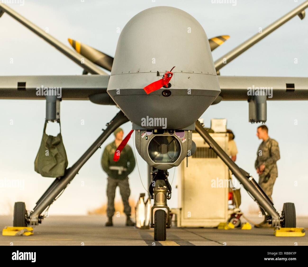 Airmen with the 49th Aircraft Maintenance Squadron tow an MQ-9 Reaper ...