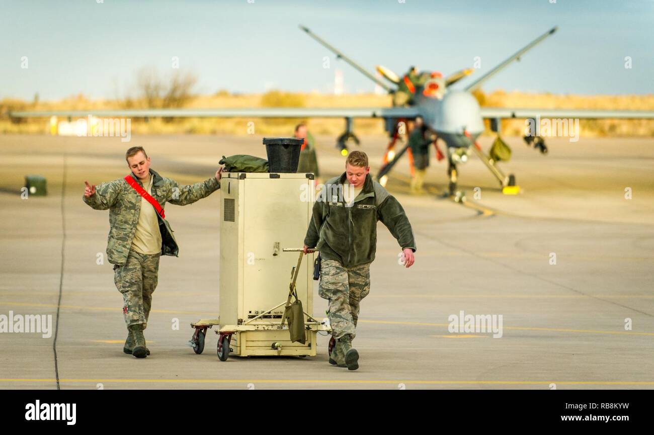 Airman 1st Class Mitchell Snell and Airman 1st Class Curtis Paff, with ...