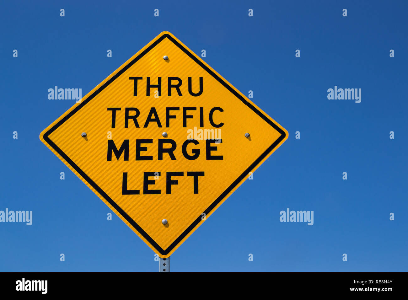 Traffic sign merge road ahead hi-res stock photography and images - Alamy