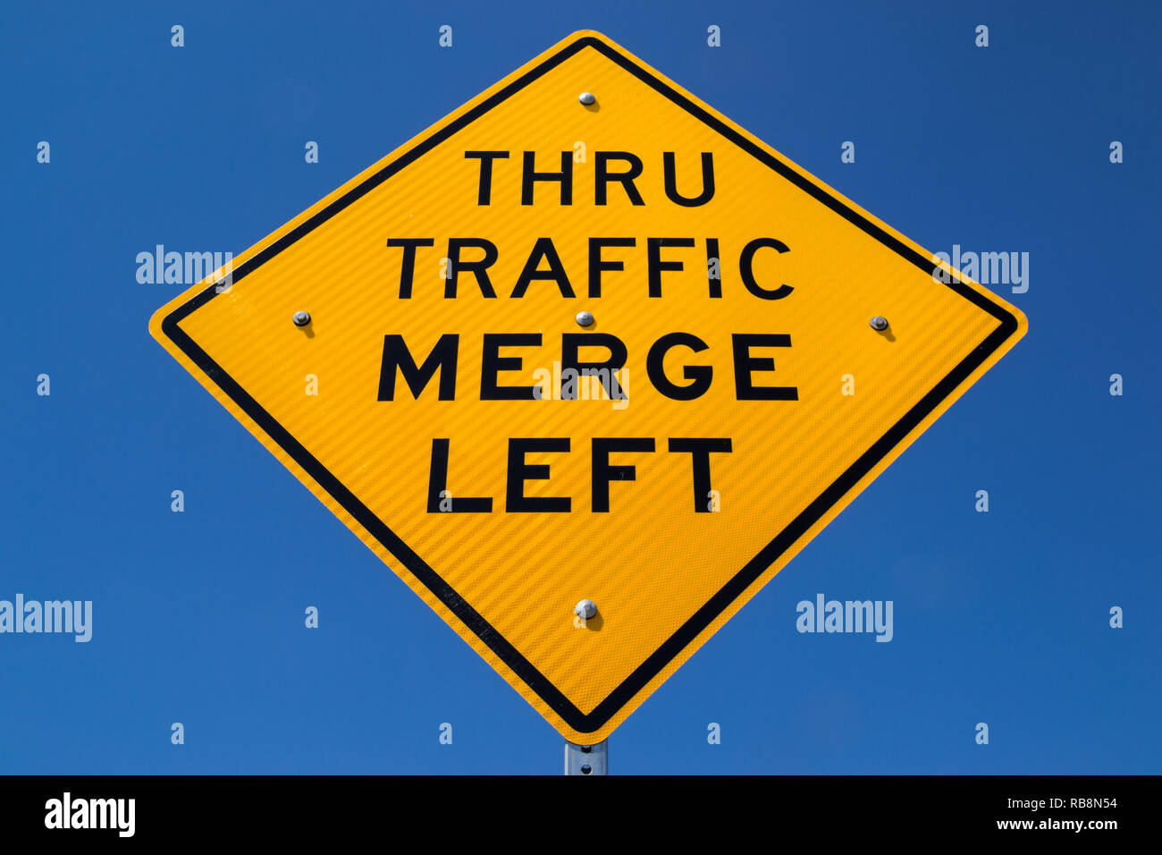 Traffic sign merge road ahead hi-res stock photography and images - Alamy