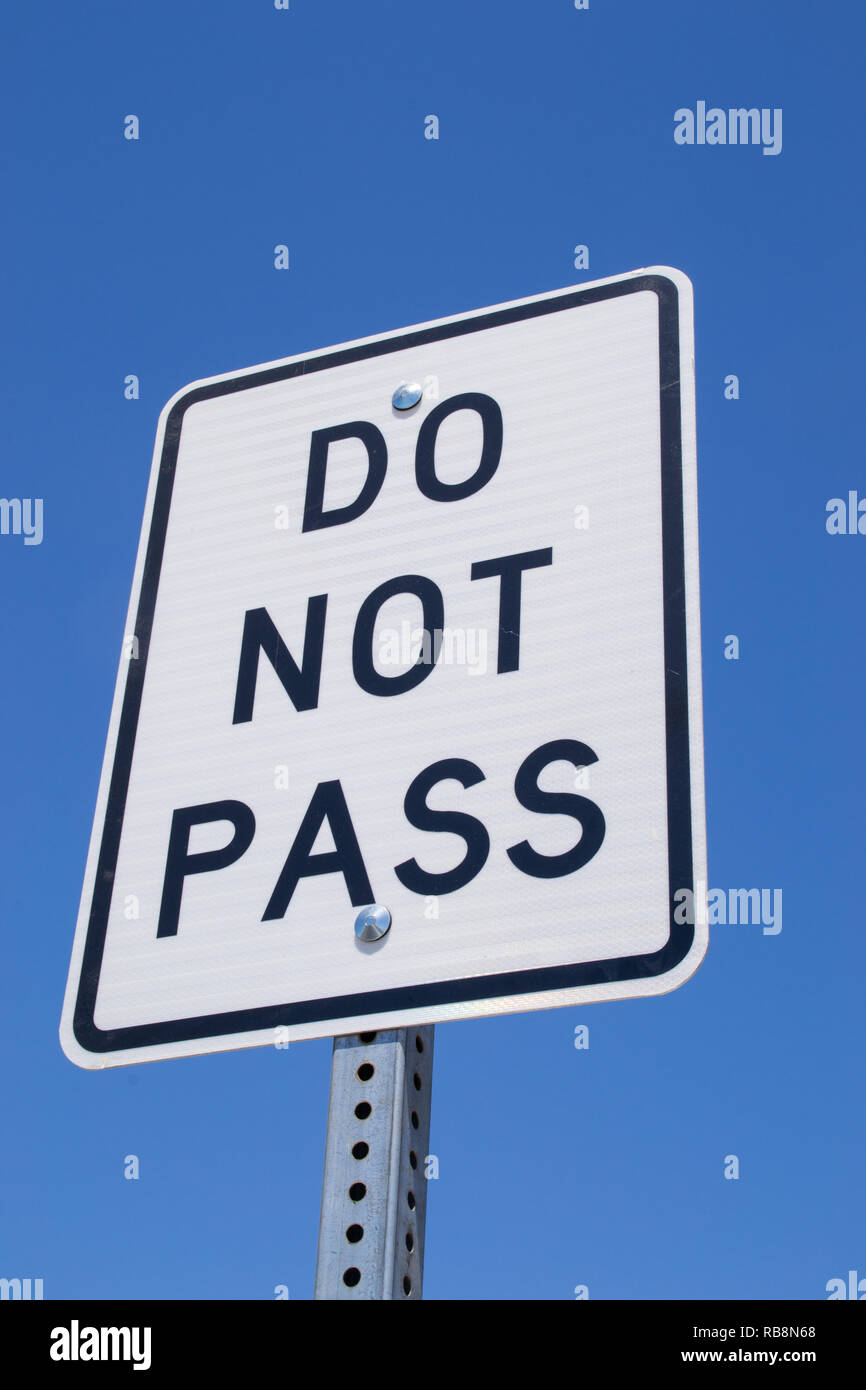 The "Do not pass" sign with California blue skies in the background ...