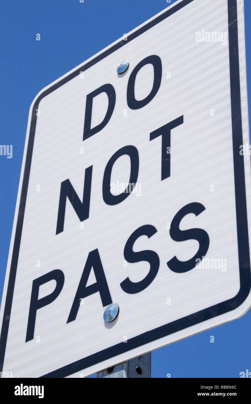 The "Do not pass" sign with California blue skies in the background ...