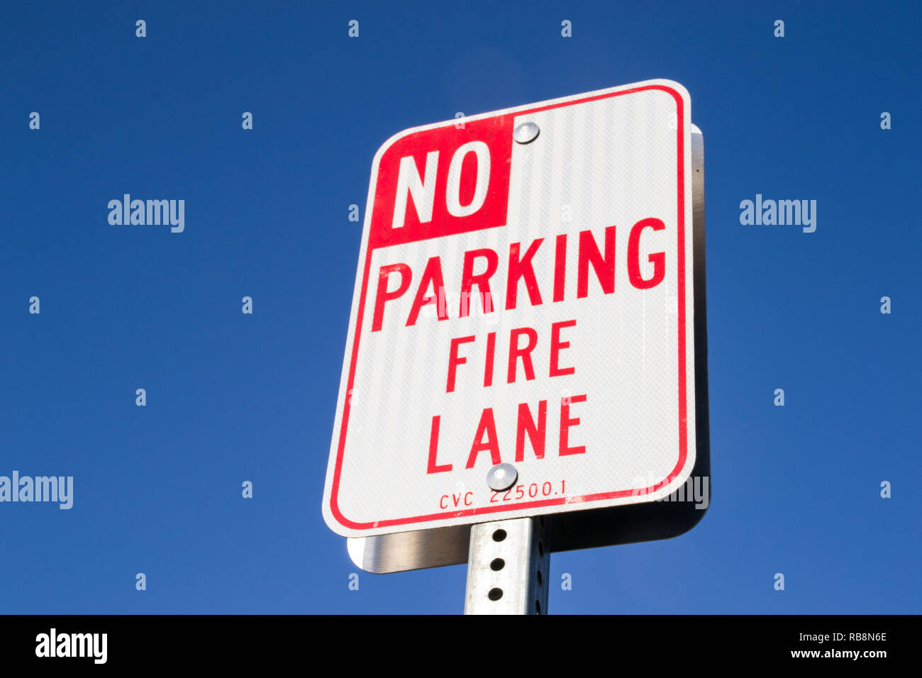 The "No parking fire lane" sign Stock Photo - Alamy