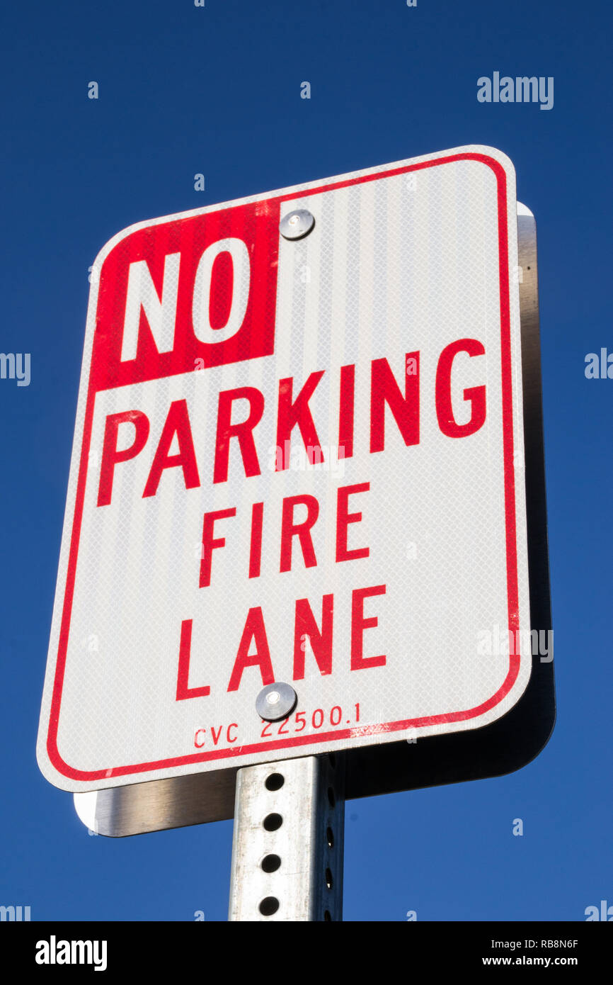 The "No parking fire lane" sign Stock Photo - Alamy