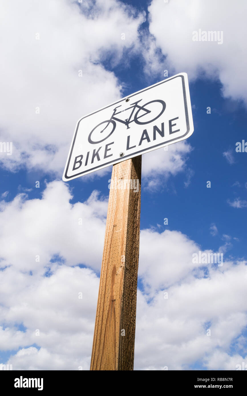 The "Bike Lane" street sign in the California sun Stock Photo - Alamy