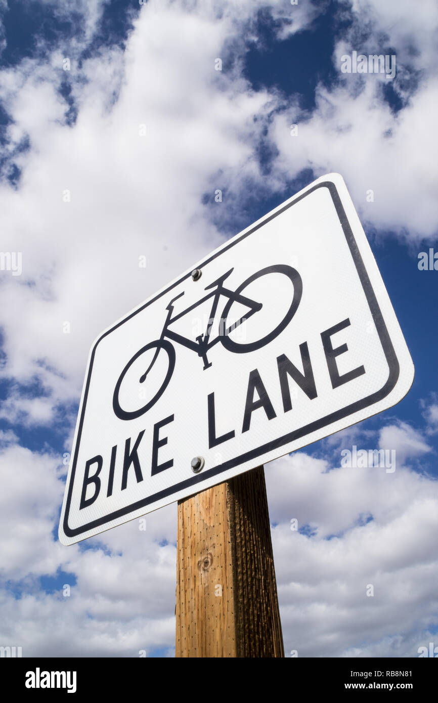 The "Bike Lane" street sign in the California sun Stock Photo - Alamy