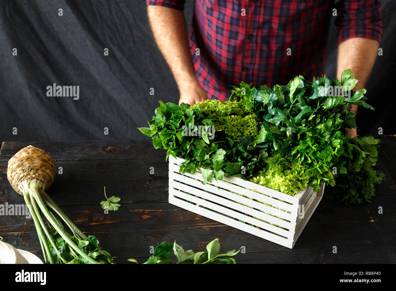 Man holds box with freshly home crop harvesting concept Stock Photo - Alamy