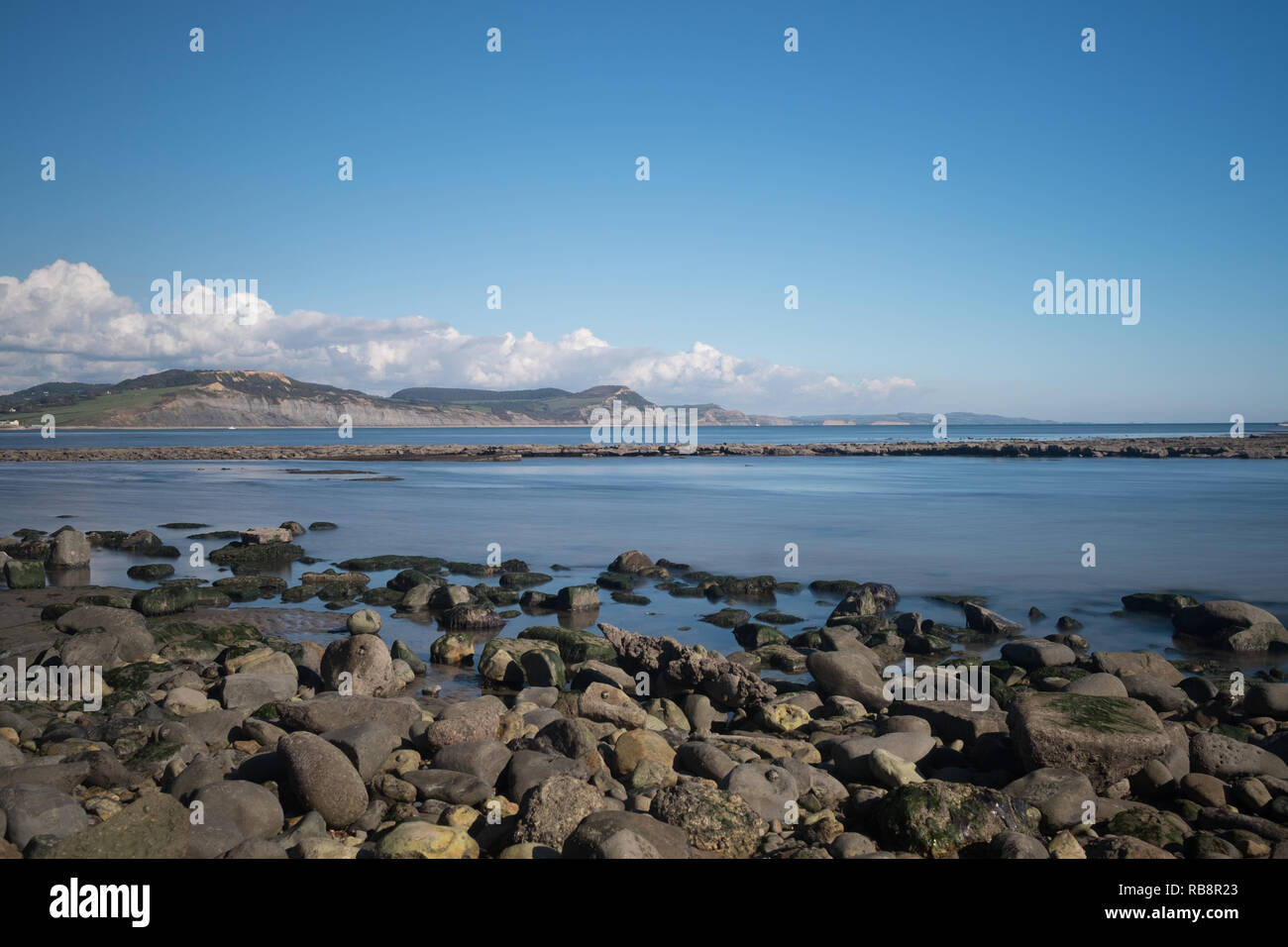 Rocks and sea at Lyme Regis Dorset Stock Photo - Alamy