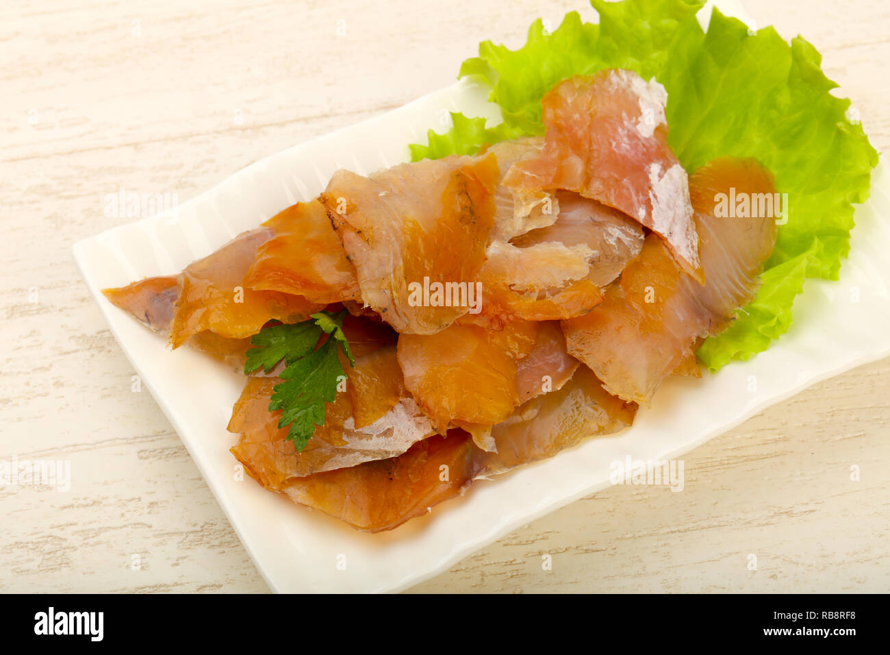Smoked catfish fillet carpaccio Stock Photo - Alamy