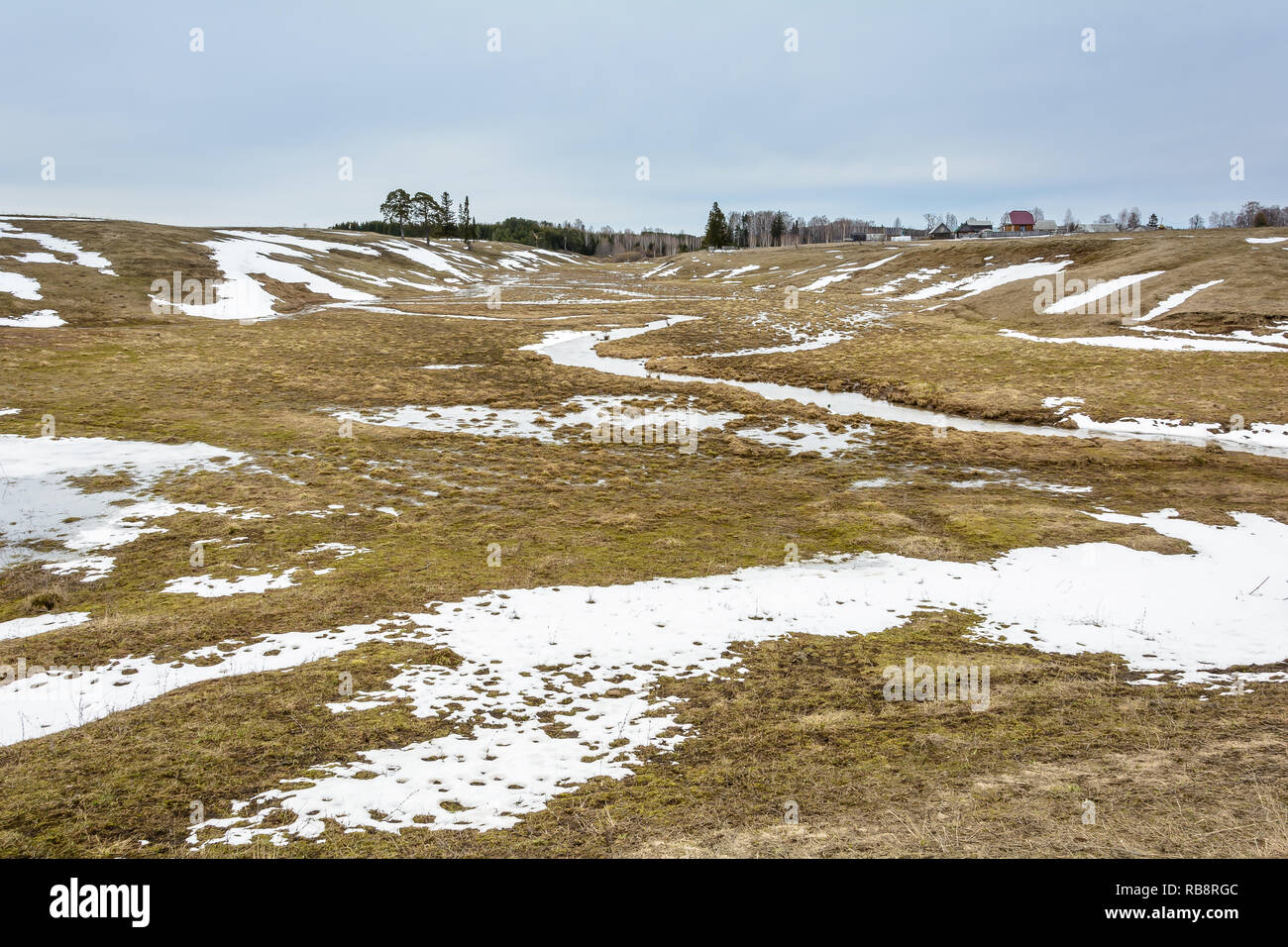 The melting of the snow on the fields in early spring Stock Photo - Alamy