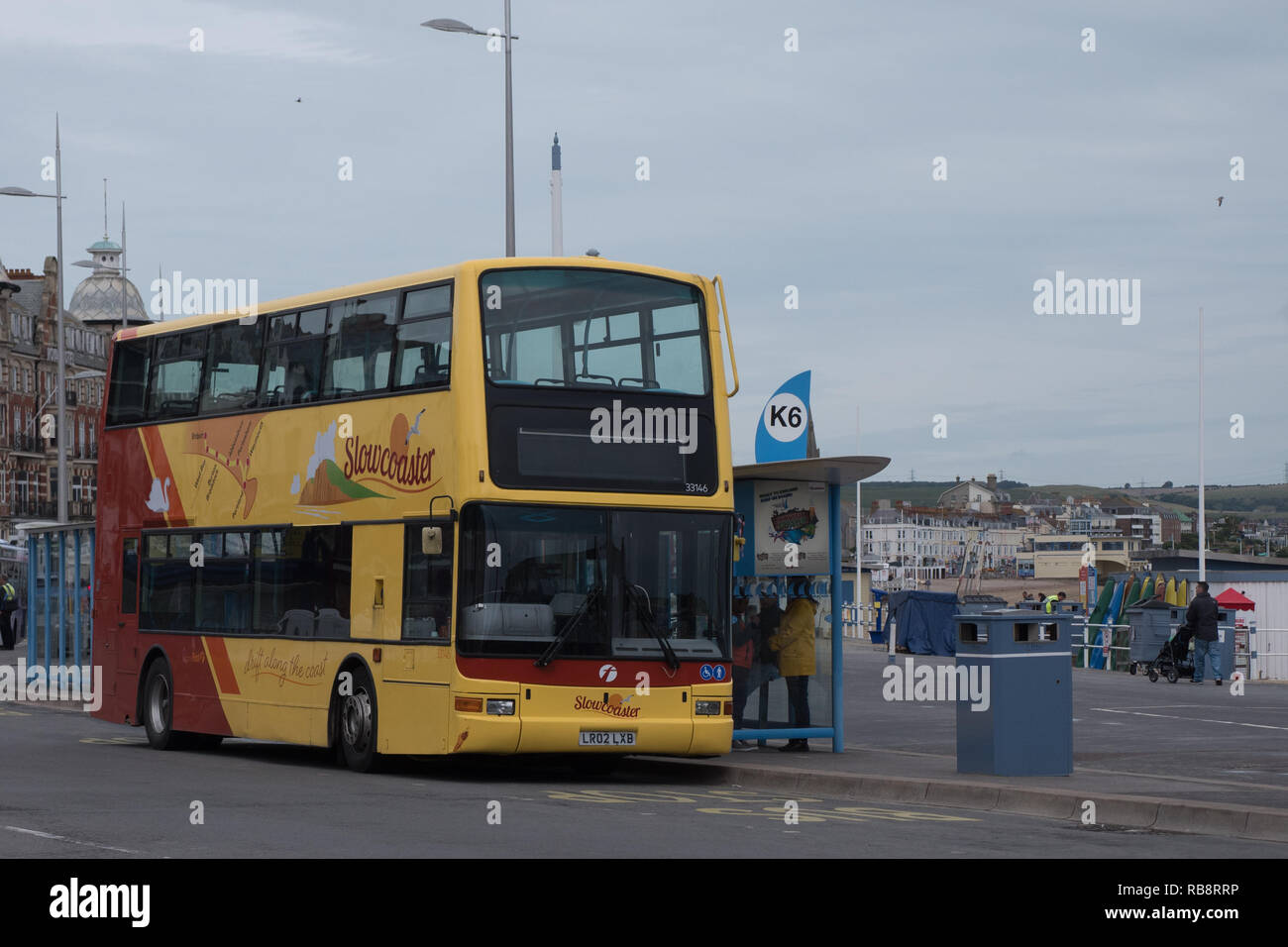 First Wessex, slow-coaster bus loading passengers in Weymouth, a sea ...