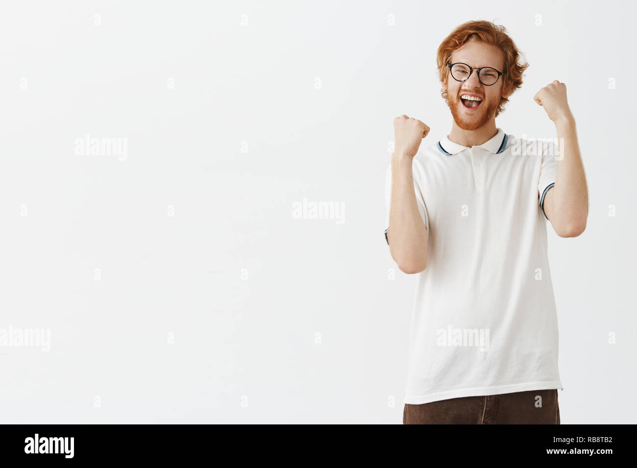 Joyful optimistic man made bet and won millions feeling happy ...