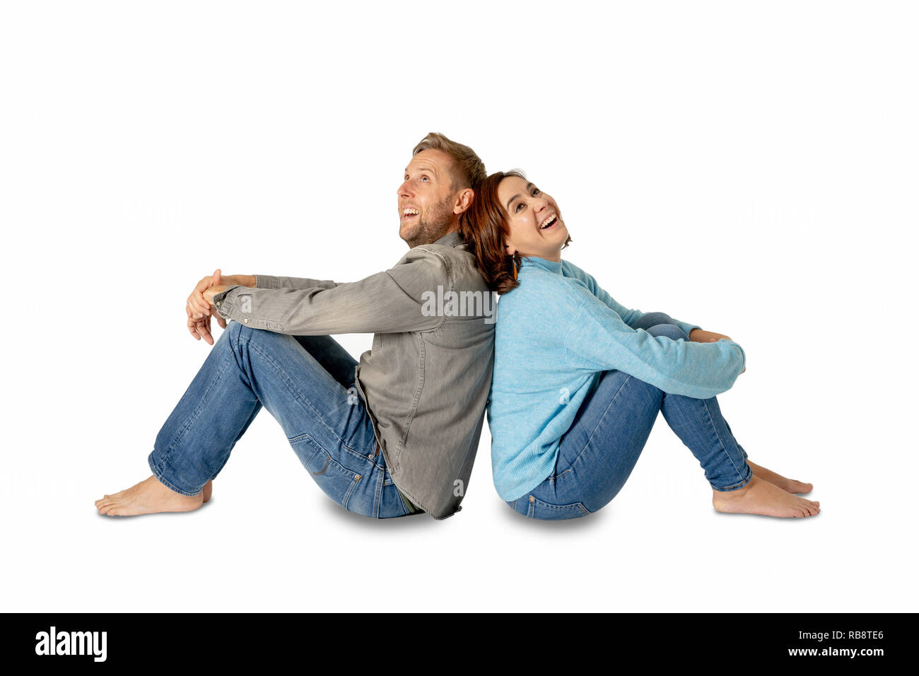 Happy couple isolated on white background with copy space Thinking and ...