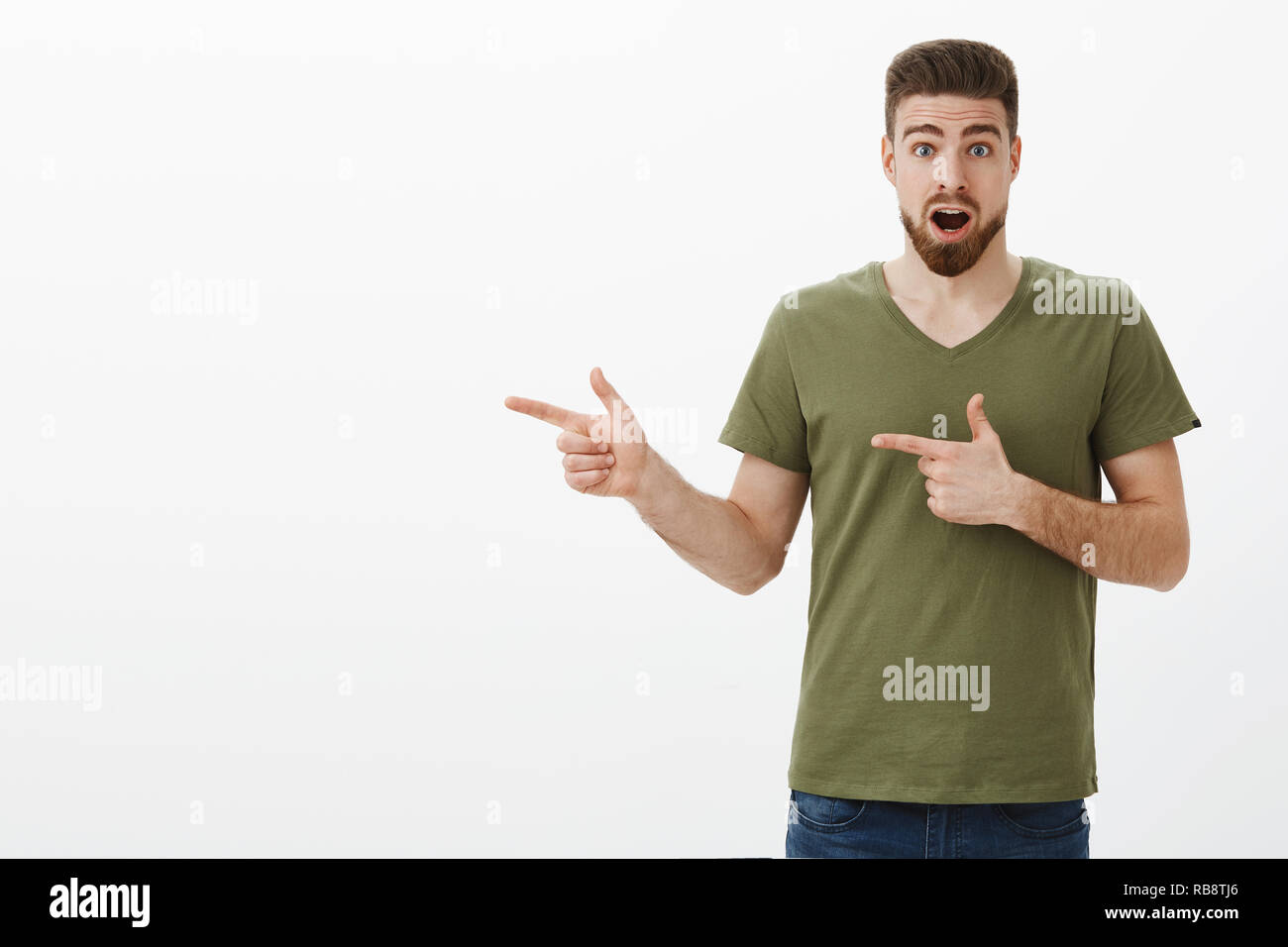 Omg check it out. Portrait of surprised and amazed good-looking ...