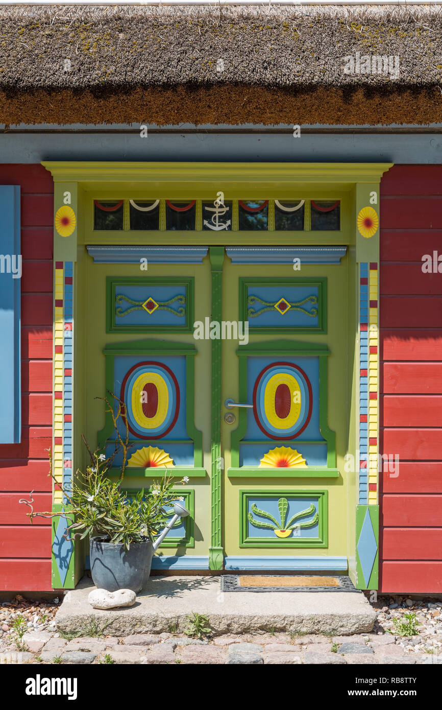 Elaborately crafted and colorful front door Stock Photo - Alamy