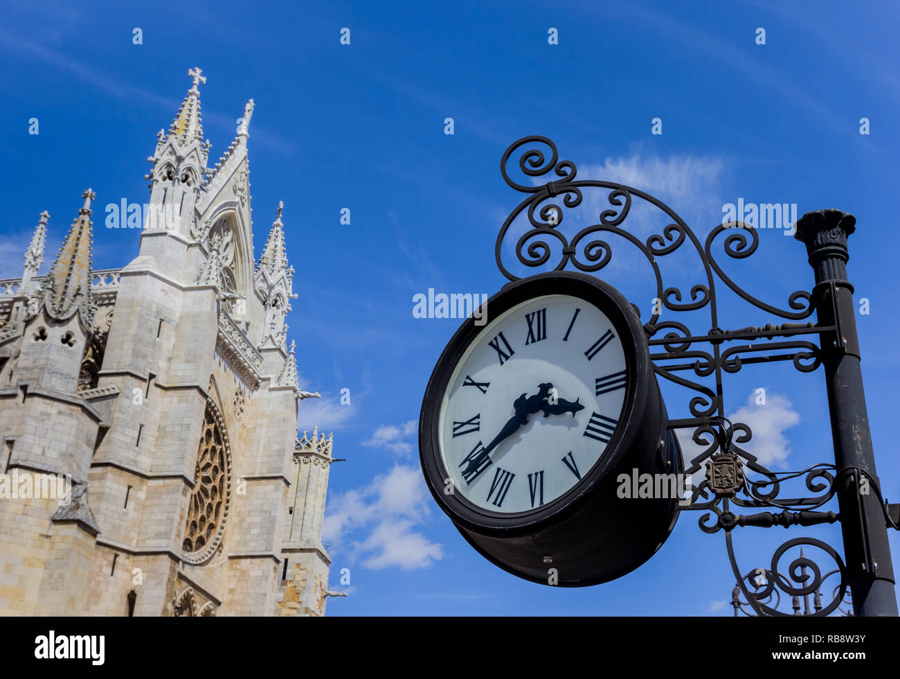 Clock and cathedral tower in Leon, Spain Stock Photo - Alamy