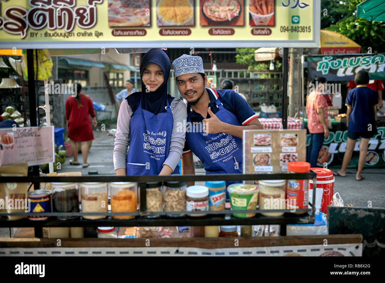 Muslim street food vendors. Young Muslim couple, Thailand, Southeast ...