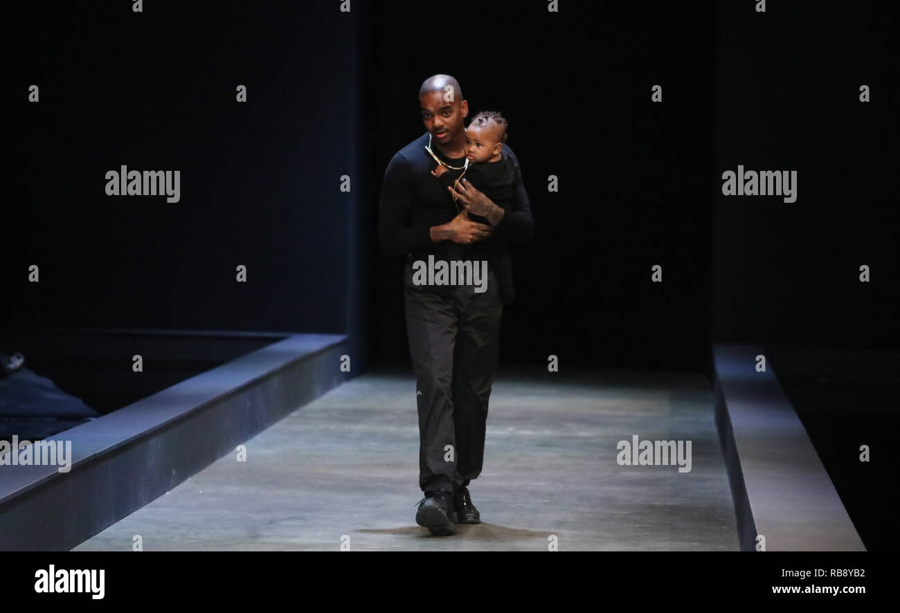 Designer Samuel Ross acknowledges the audience on the catwalk during ...